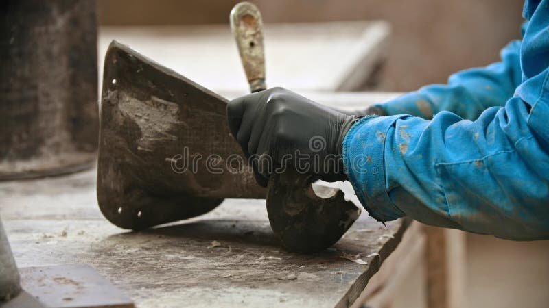Concrete Industry - Man Worker Cleaning the Form for Concrete Casting ...