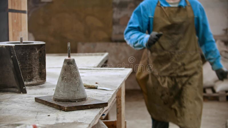 Concrete Industry in Workshop - Worker Preparing the Form for Working ...