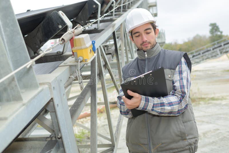 Site Inspector Making Inspection Report in Industrial Hall Stock Image ...