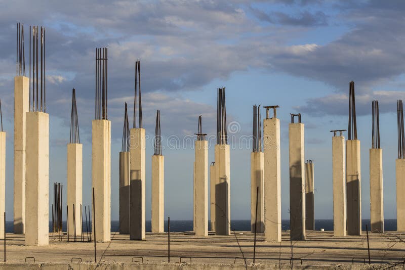 Concrete and iron pillars stock image. Image of construction - 165725325