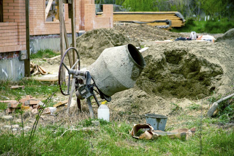Concrete Mixer in Construction. Cement Mixer at a Construction Site ...