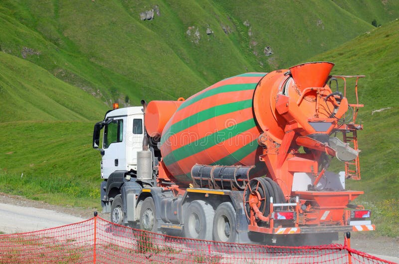 Concrete Mixer Transporting Construction Materials on Building Site ...