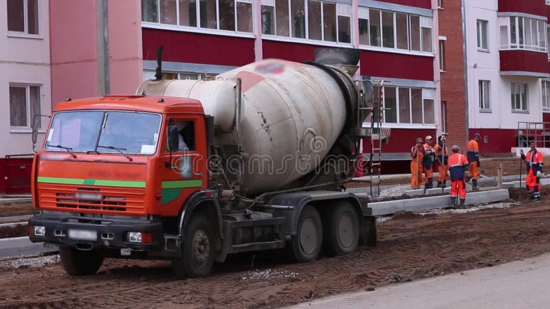 The Concrete Mixer Truck Ride on a Road. Stock Video - Video of traffic ...