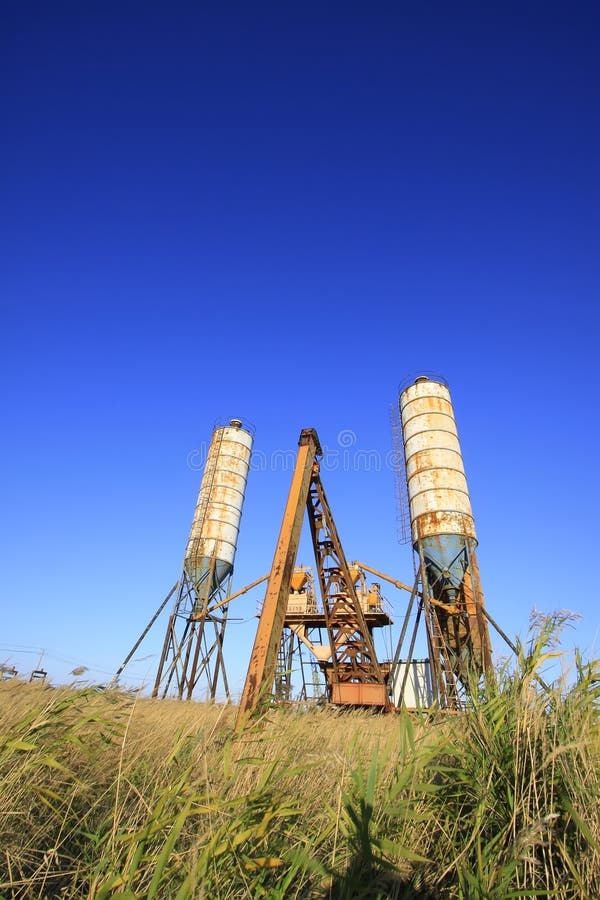 Concrete mixing tower. stock photo. Image of industrial - 124079248
