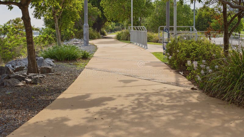 A Concrete Outdoor Walking Track Stock Photo - Image of long, railings ...