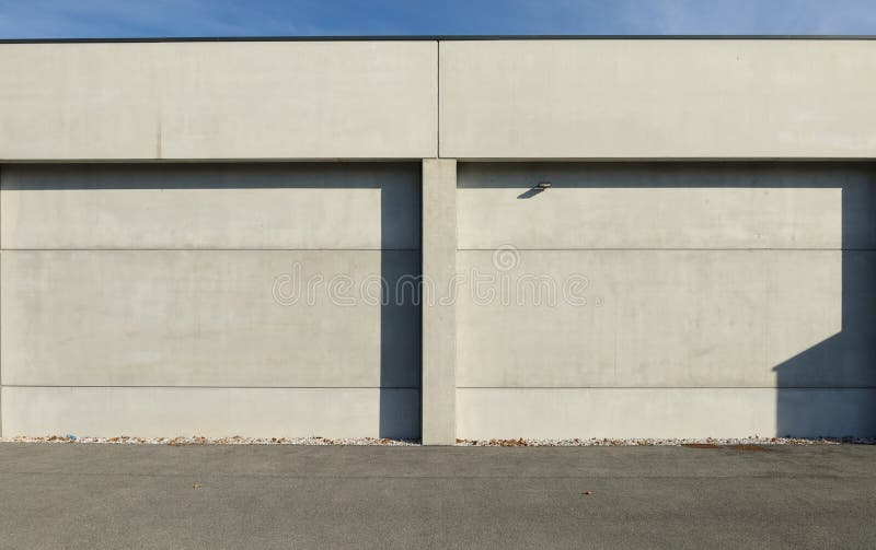 Concrete Panel Facade with a Column in the Middle. Aspalth Road in ...