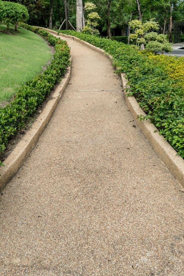 Concrete Pathway in garden stock image. Image of beautiful - 114379661