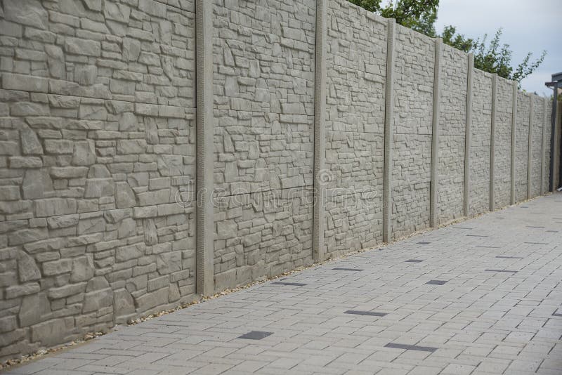 Concrete Pattern Fence and Block Paving Tiles Stock Image - Image of ...