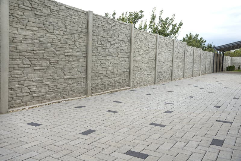 Concrete Pattern Fence and Block Paving Tiles Stock Photo - Image of ...