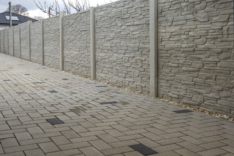 Concrete Pattern Fence and Block Paving Tiles Stock Image - Image of ...