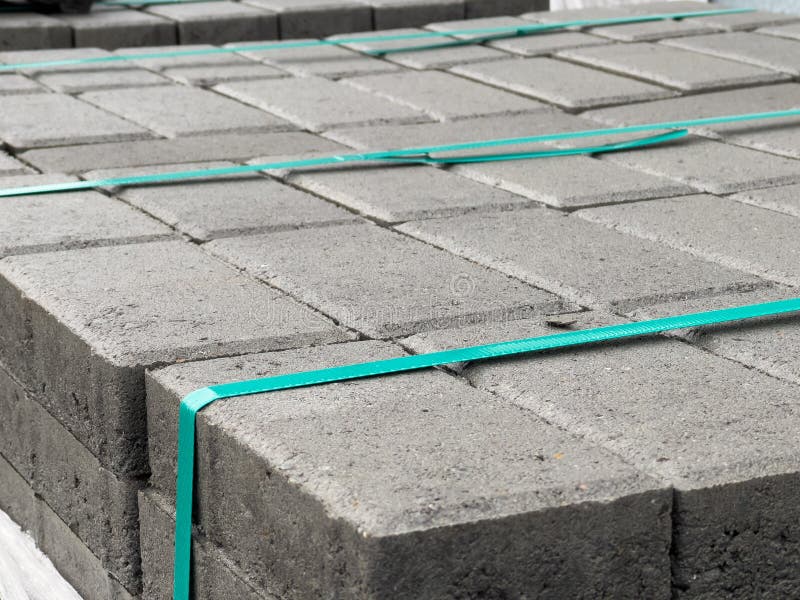 Concrete Pavement Blocks are Arranged in Neat Stacks, Secured with ...