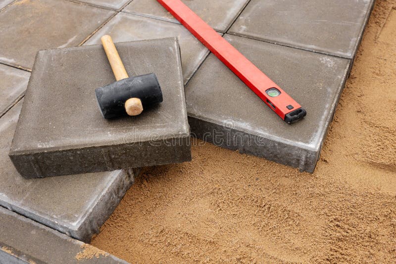 Concrete Paver Slab Installation Stock Photo - Image of tools, laying ...