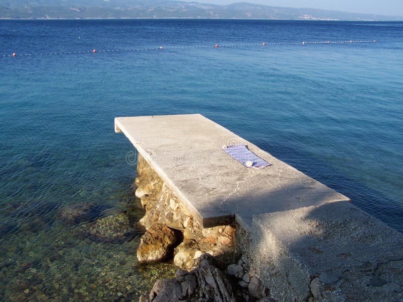 Concrete pier on the beach stock image. Image of croatia - 59118491