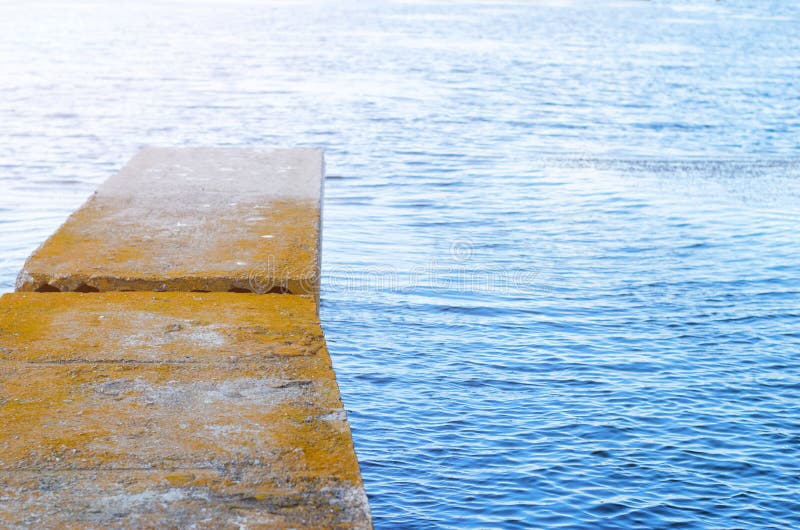 Concrete Pier and Blue Lake, Free Space. Bridge and Blue Water, Stock ...