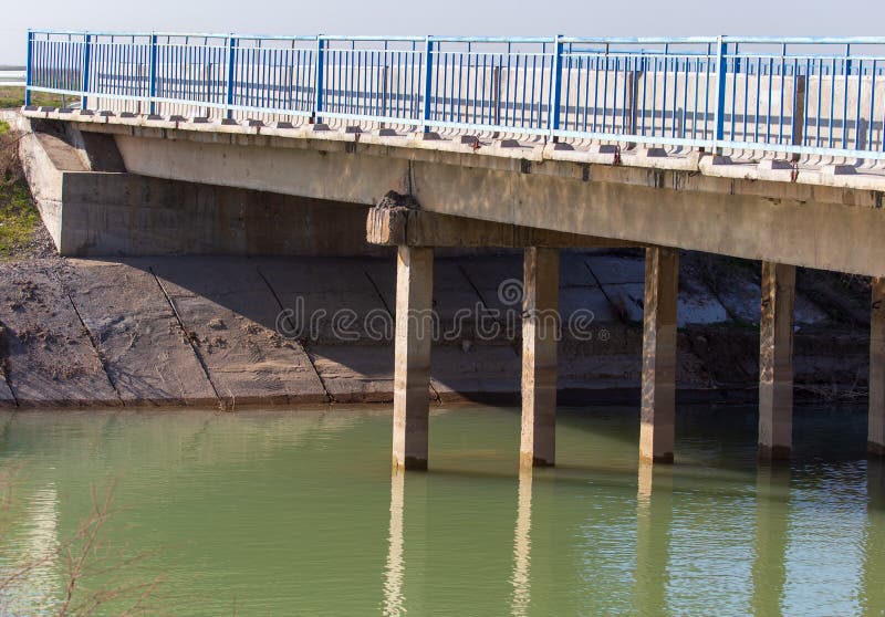Concrete Piles on a Bridge Over the River Stock Image - Image of bridge ...