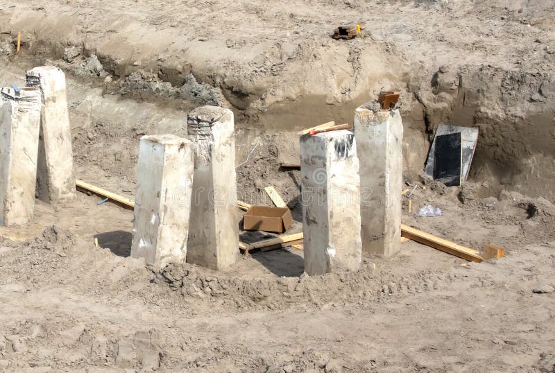 Concrete Piles Foundation for a New Building on Construction Site Stock ...