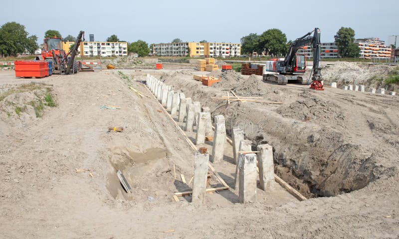 Concrete Piles Foundation for a New Building on Construction Site Stock ...