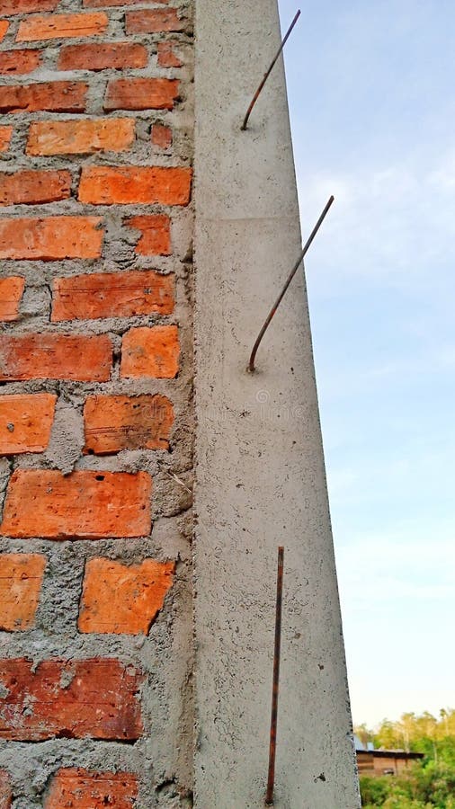 The Concrete Pillar of the Wall Building are Tied with Red Bricks Stock ...
