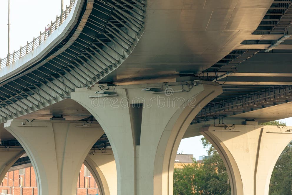 Concrete Pillars of a Large Bridge. Bottom View Stock Photo - Image of ...