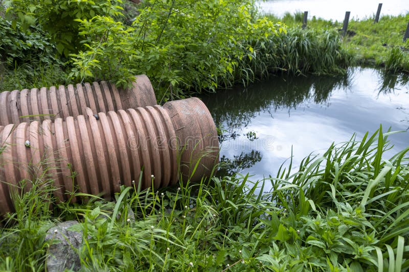 Concrete Pipe of the Rubble from Which Water Flows into Nature Stock ...