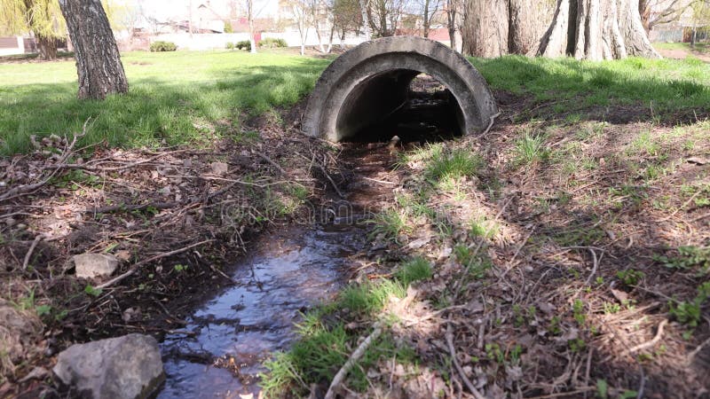 Concrete Pipe of the Rubble from Which Water Flows into Nature Stock ...