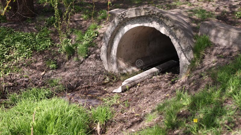 Concrete Pipe of the Rubble from Which Water Flows into Nature Stock ...
