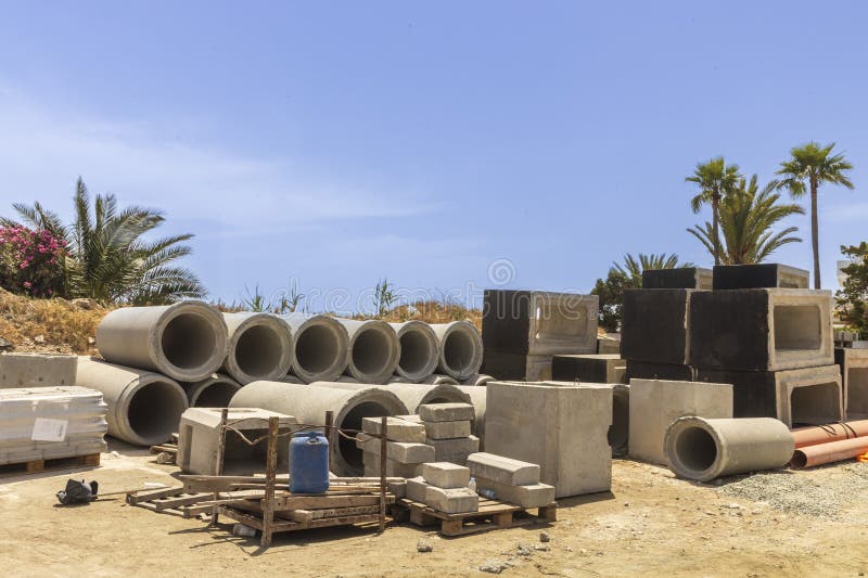 Concrete Pipes and Blocks stock photo. Image of sunny - 381562822