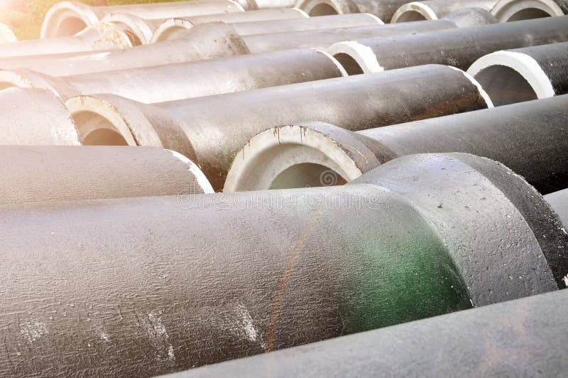Concrete Pipes Coated with Protective Mastic at a Construction Site ...