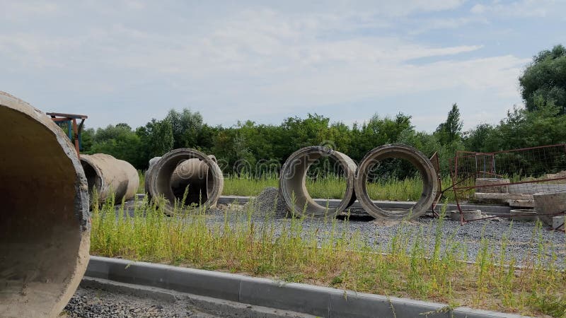 Concrete Pipes on a Road Under Construction Stock Footage - Video of ...