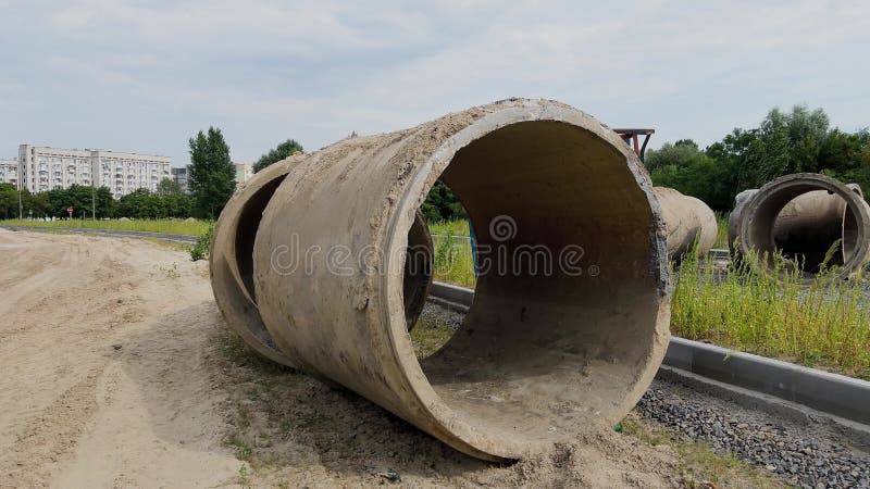 Concrete Pipes on a Road Under Construction Stock Video - Video of ...