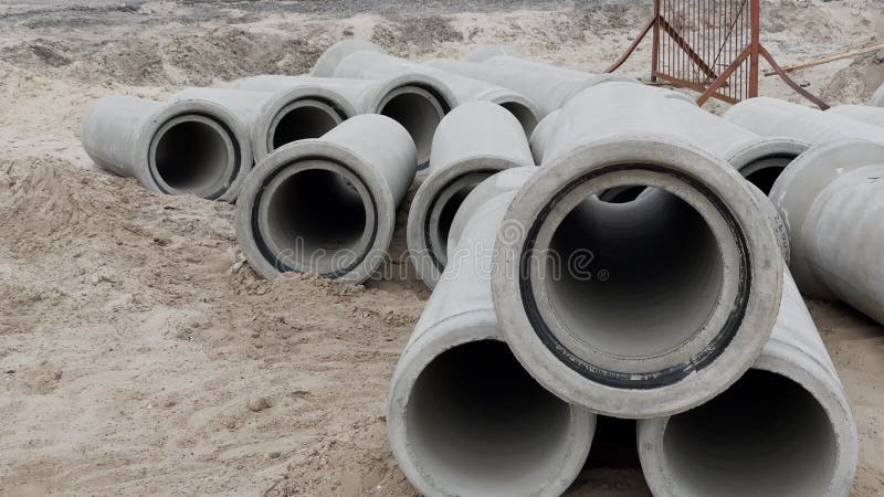 Concrete Pipes on a Road Under Construction Stock Video - Video of ...