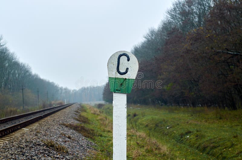 Concrete Post with a Letter Stock Image - Image of railroad, post ...