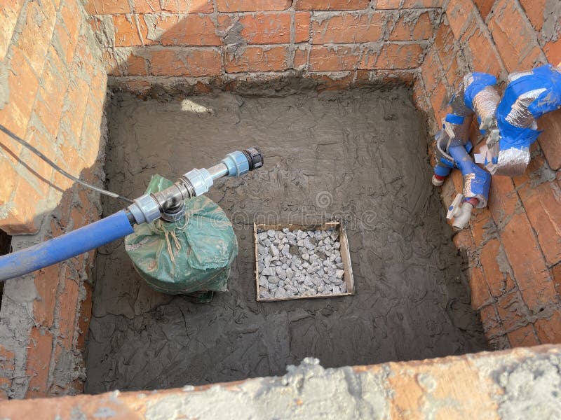 Concrete Pouring Process for Small Well Foundation Pit Stock Photo ...