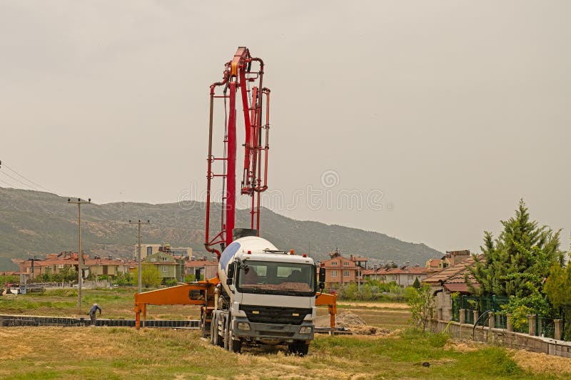 Concrete Pump at Construction Site. Concrete Pouring with Pump Stock ...