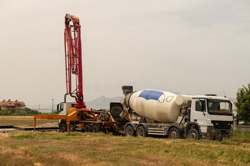 Concrete Pump at Construction Site. Concrete Pouring with Pump Stock ...