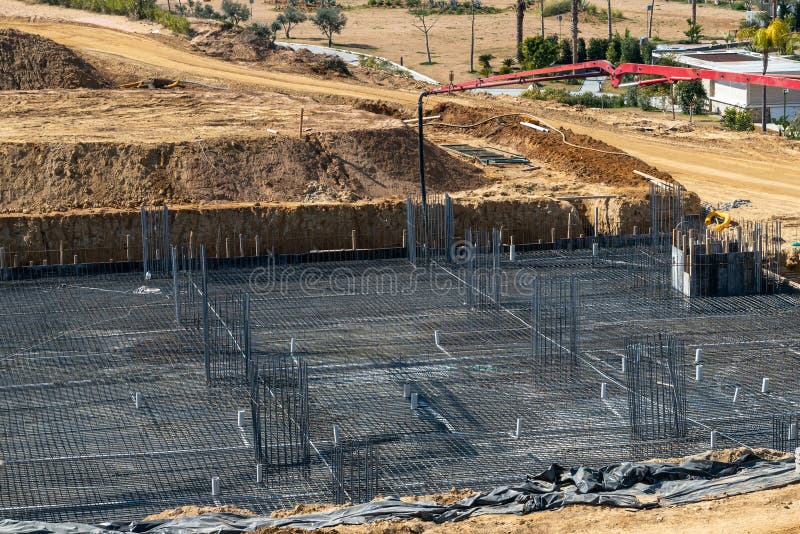 Concrete Pump Working on Reinforced Foundations at a Large Construction ...