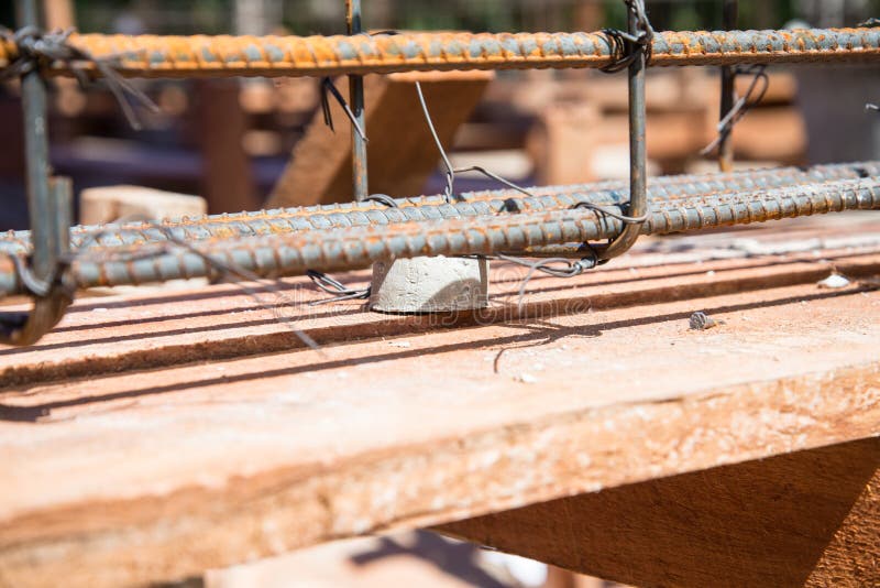 A Concrete Rebar Chair is Supporting Rebar To Make Correct Alignment ...