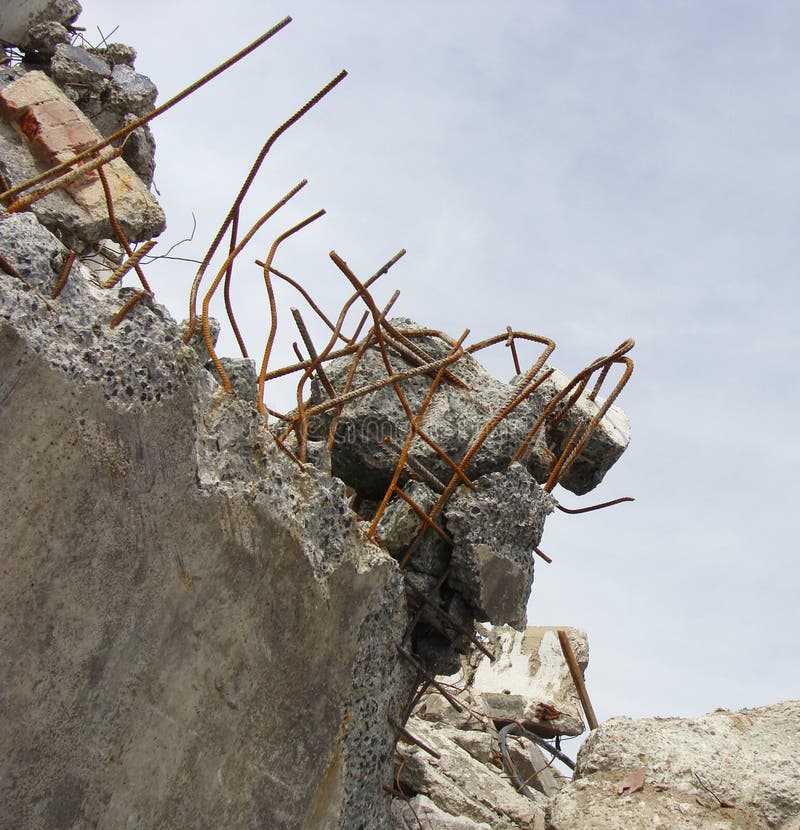 Concrete Rubble and Twisted Rusty Metal on a Demolition Site Stock ...