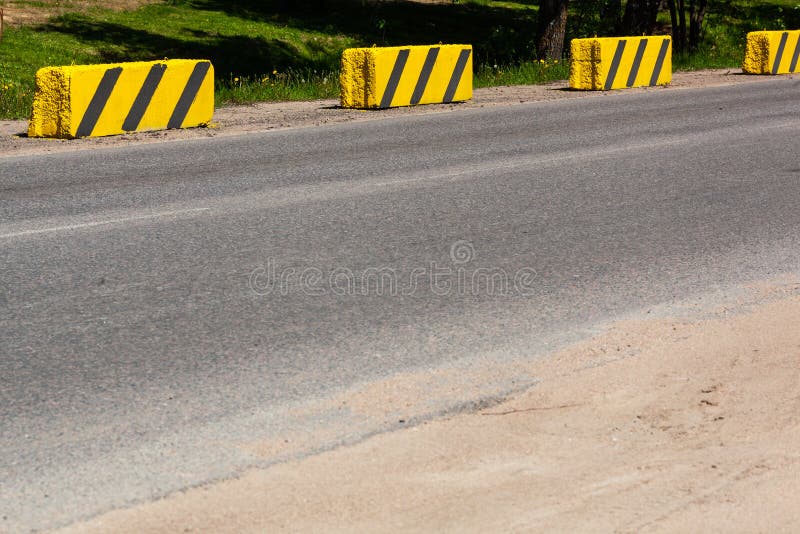 Concrete Safety Block Installed on the Side of the Road Stock Photo ...