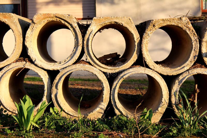 Concrete Sewer Pipe Exit Covered with Red Bricks and Broken Concrete ...