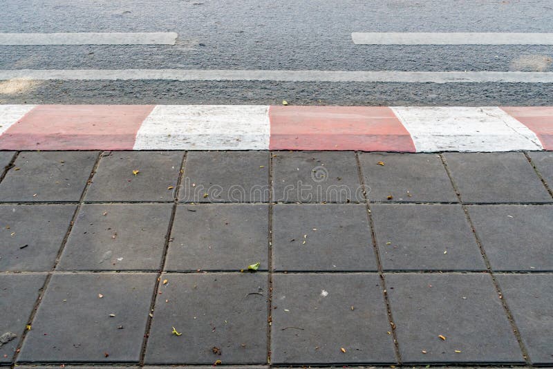 Concrete Sidewalk with Red and White Stock Image - Image of driveway ...