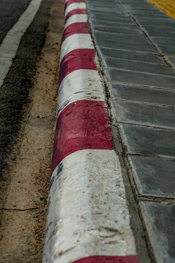 Concrete Sidewalk with Red and White Stock Image - Image of road ...