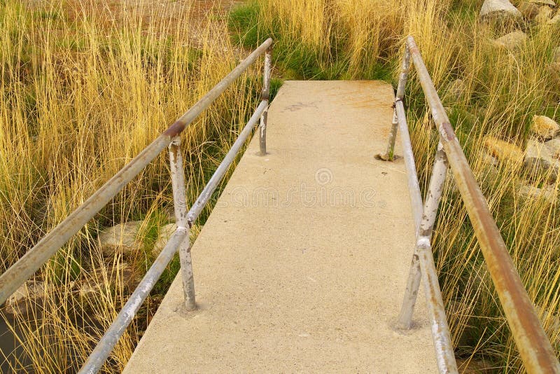 Concrete Sidewalk with Steel Railing Stock Photo - Image of steel ...