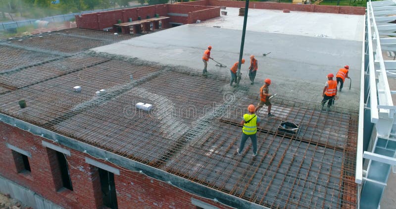 Workers Create Concrete Formwork. Concrete Slab Creation. Construction ...