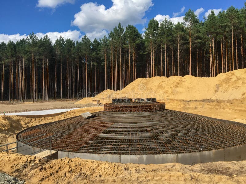 Concrete Slab Foundation in a Forested Area in Front of a Group of Pine ...