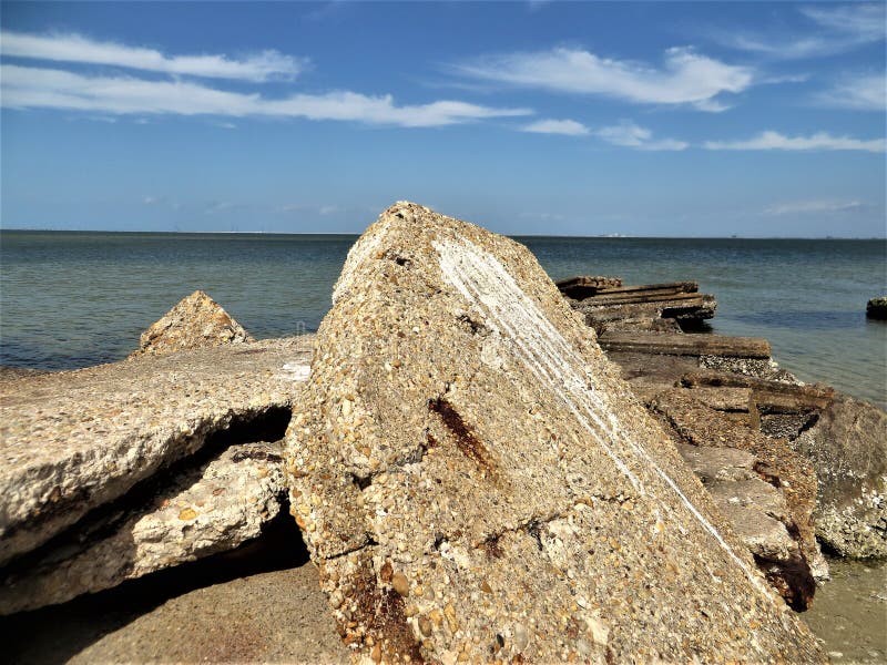 Barnacles Amid Chunks of Demolished Concrete Pier Stock Image - Image ...