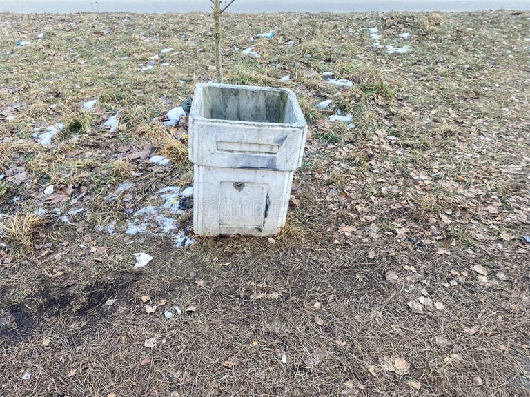 Concrete Street Trash Receptacle Embedded in the Ground Stock Image ...