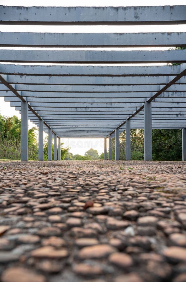 Concrete Structure with a Pathway Leading To a Green Landscape in the ...