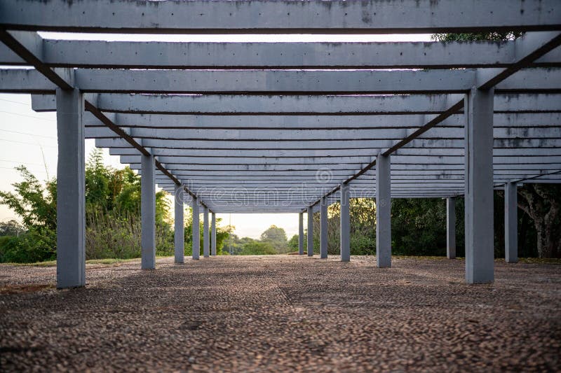Concrete Structure with a Pathway Leading To a Green Landscape in the ...