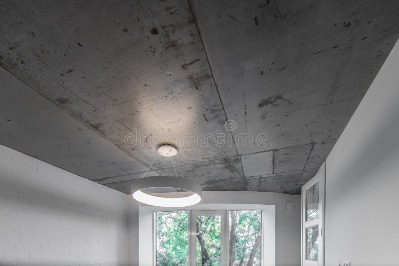 Concrete Ceiling and Lighting in a Modern Apartment. Concrete Style in ...